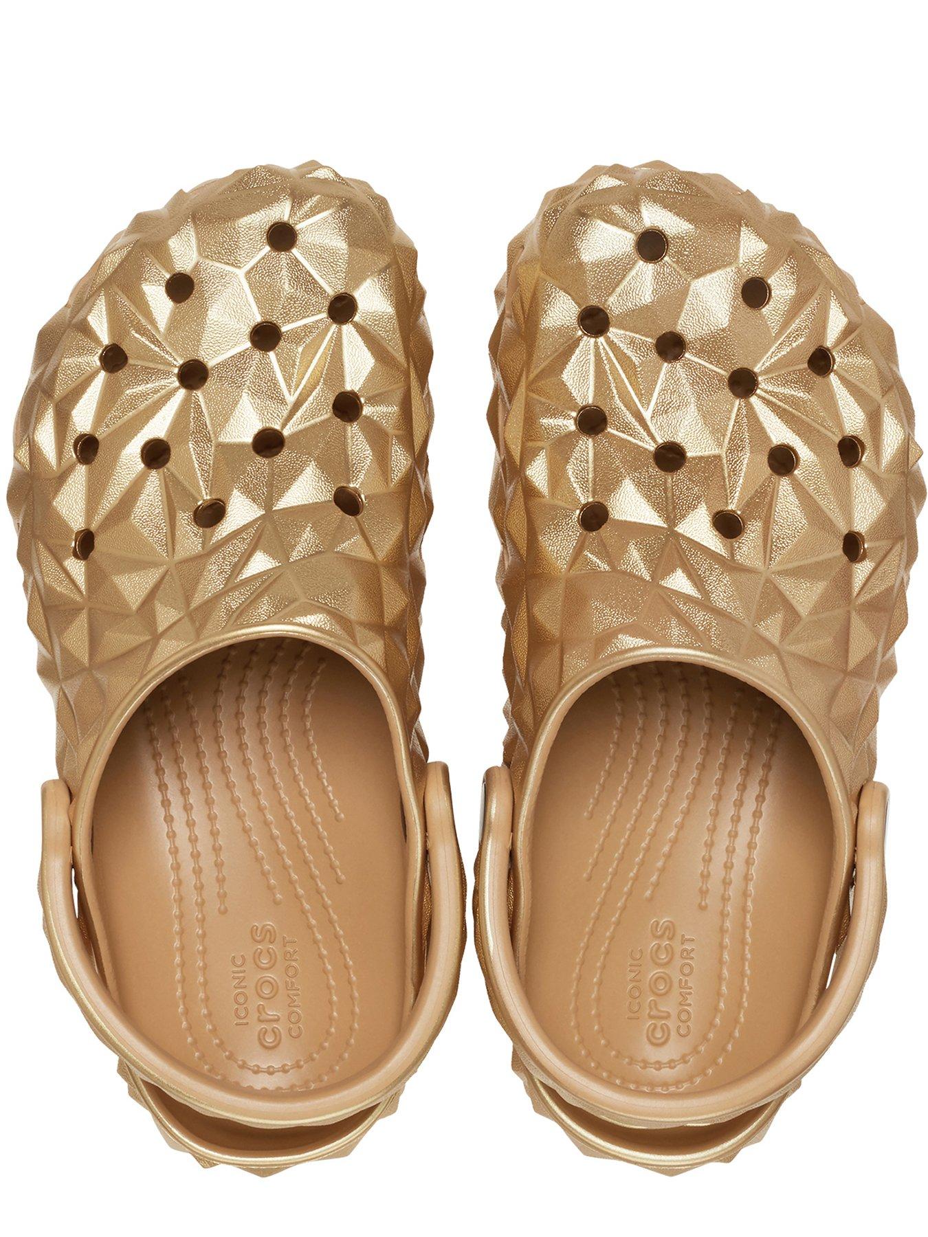 Metallic gold crocs store